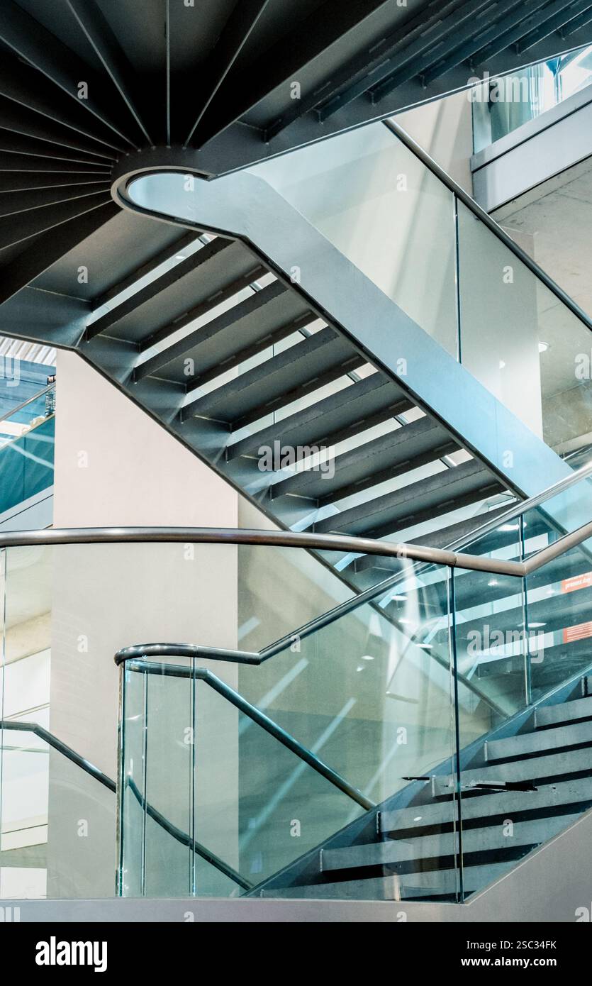 Modern glass staircase with multiple flights of stairs Stock Photo - Alamy