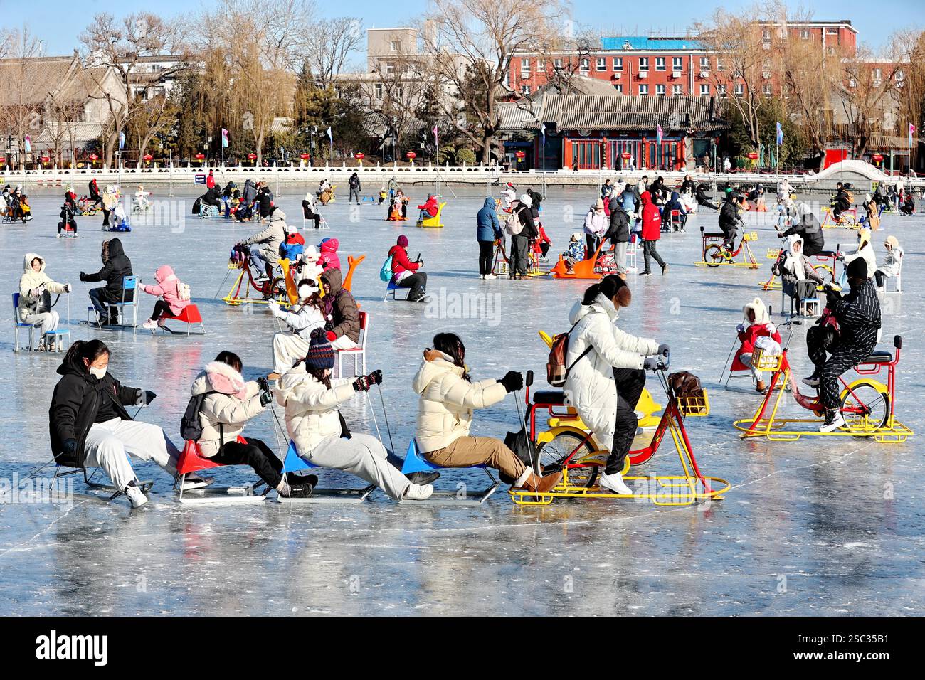 Visitors skate at an outdoor rink at Shichahai in Beijing, China, 28 ...