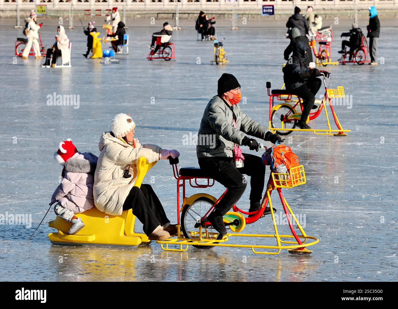 Visitors skate at an outdoor rink at Shichahai in Beijing, China, 28 ...