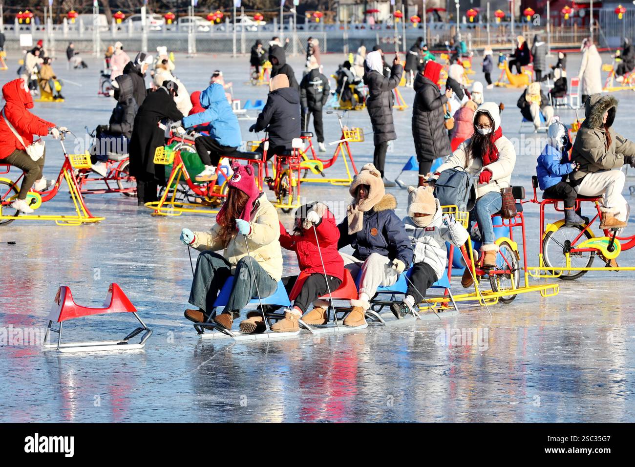 Visitors skate at an outdoor rink at Shichahai in Beijing, China, 28 ...