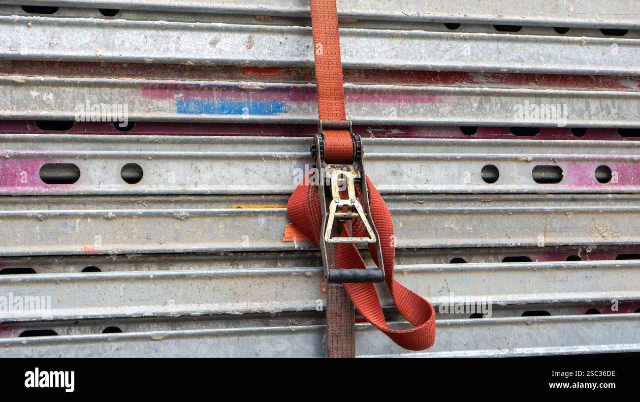 Transport securing tension belt on the truck Stock Photo - Alamy