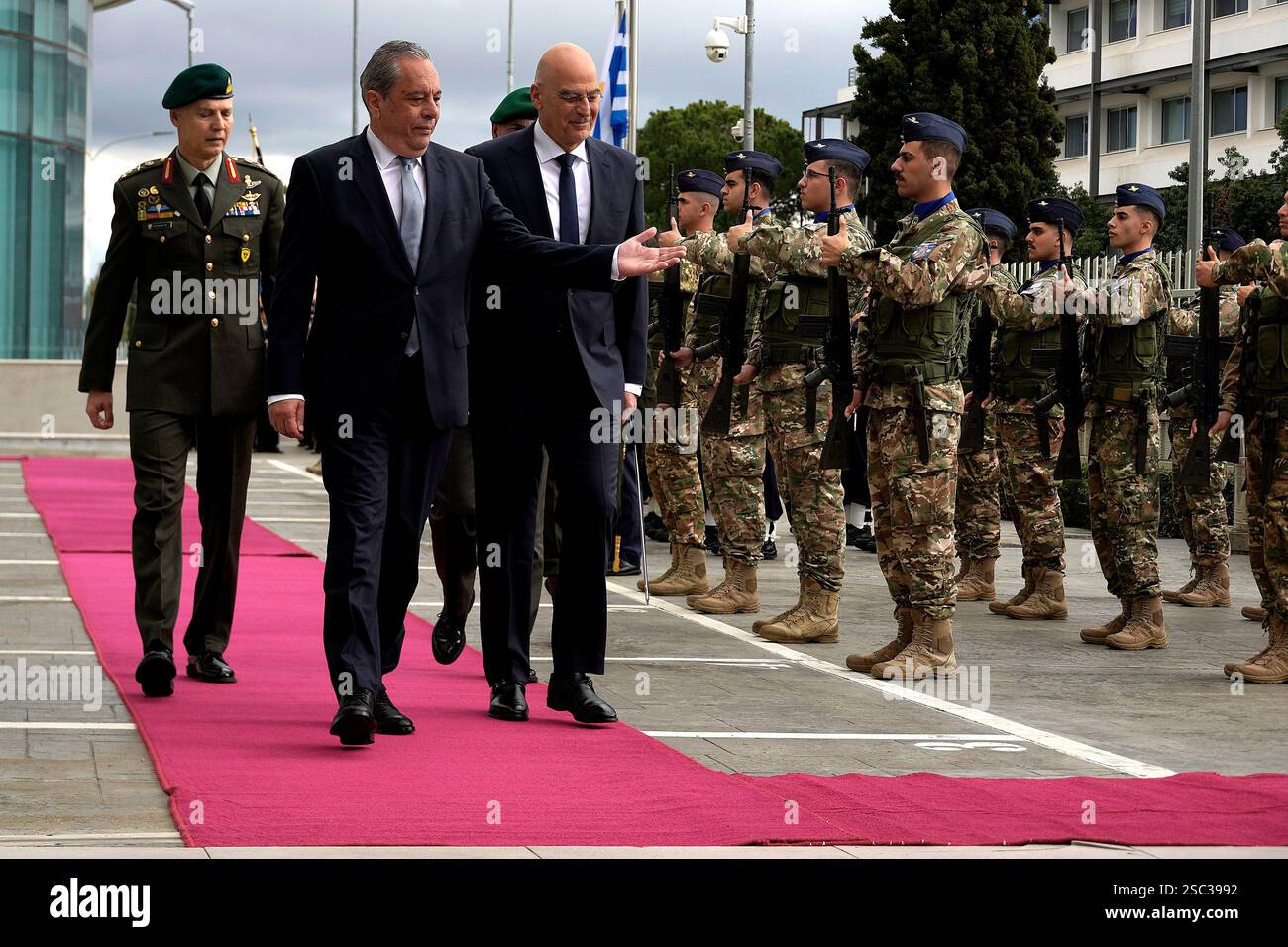 Cyprus' Minister of Defence Vasilis Palmas, left, and his Greek ...