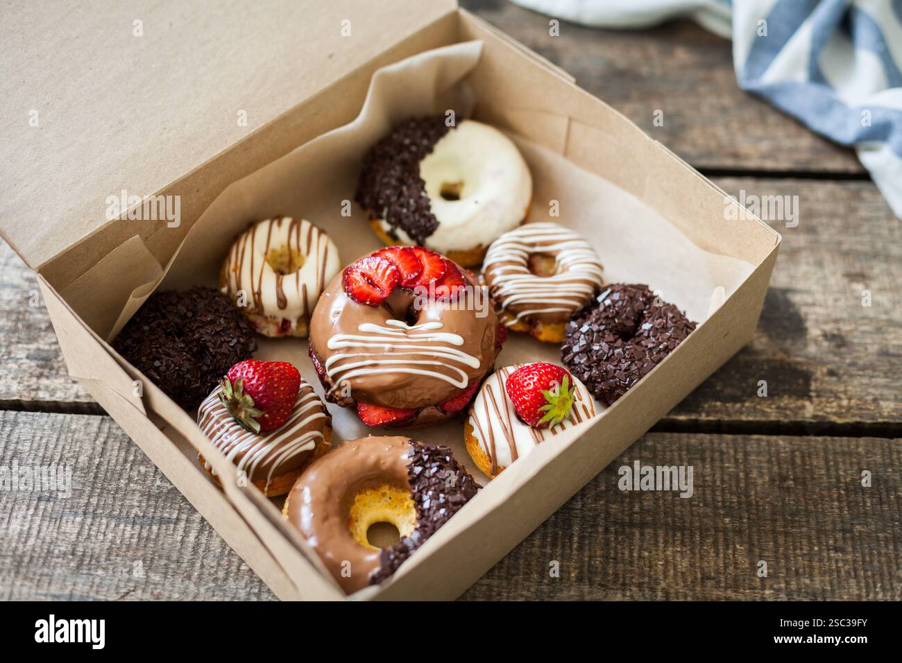 Colorful donuts in box Stock Photo - Alamy