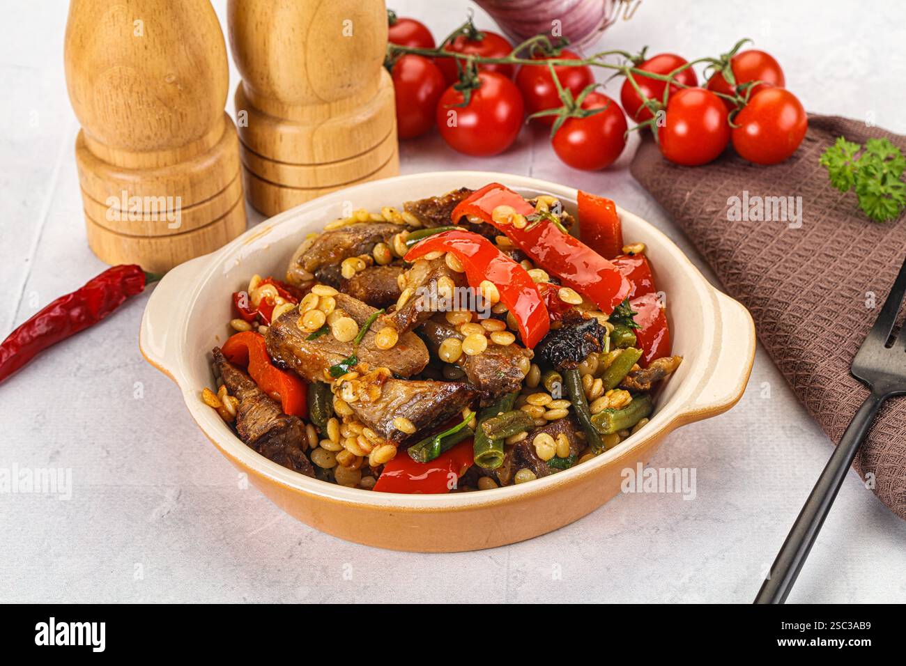Eastern cuisine - Ptitim with beef meat and vegetables Stock Photo - Alamy