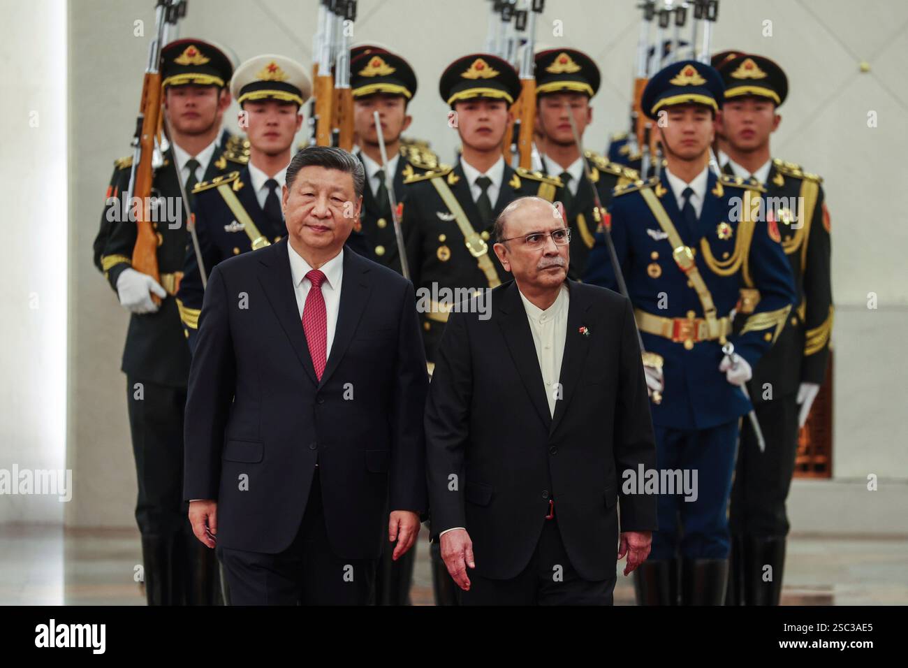 Chinese President Xi Jinping, left, and Pakistani President Asif Ali ...