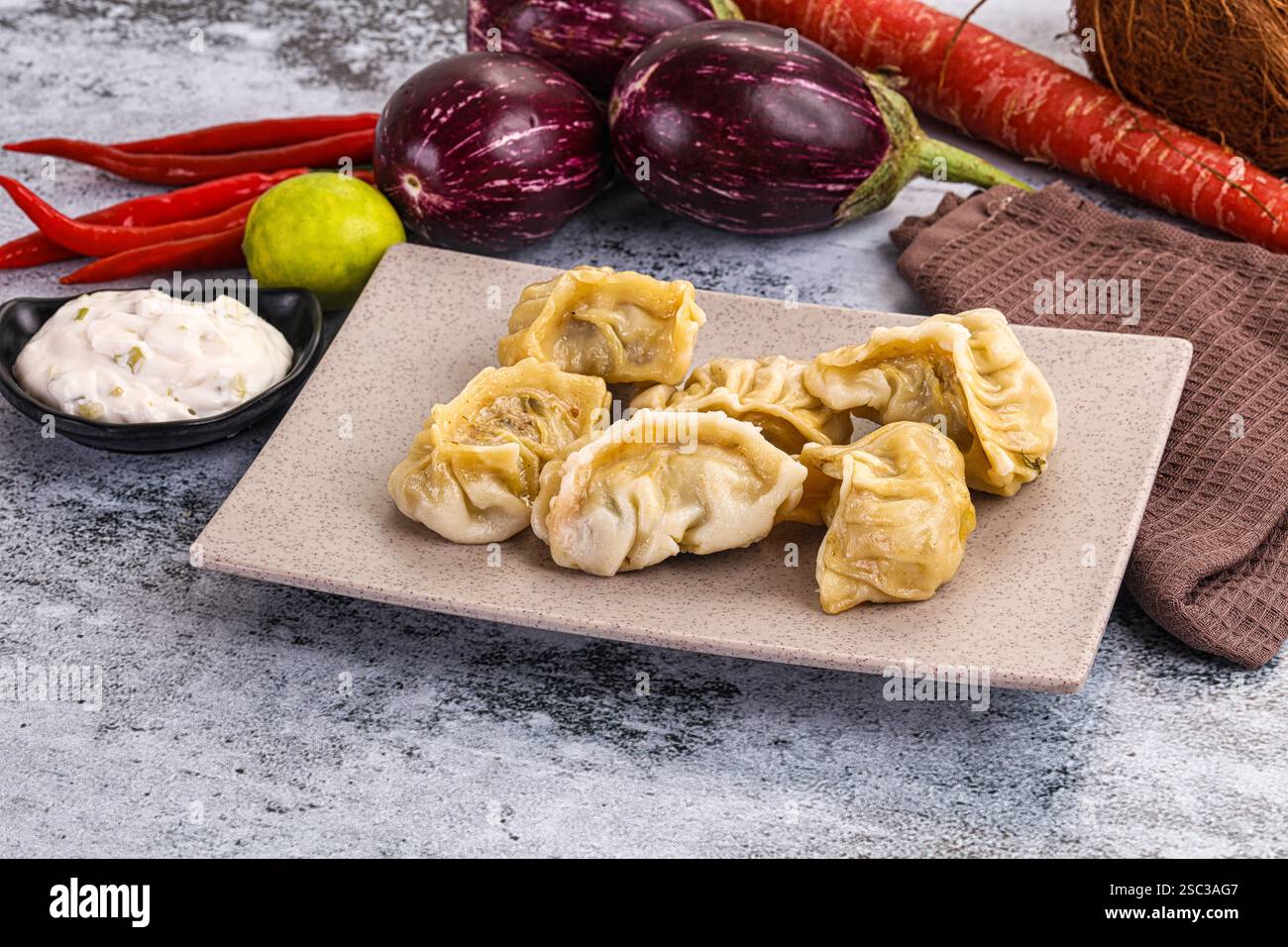 Steamed Nepali traditional Momo stuffed dumplings Stock Photo - Alamy