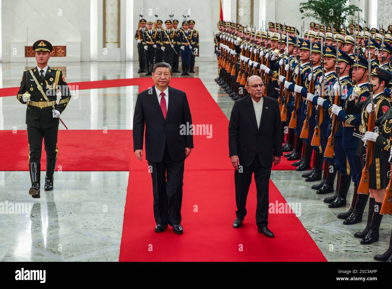 Chinese President Xi Jinping, left, and Pakistani President Asif Ali ...