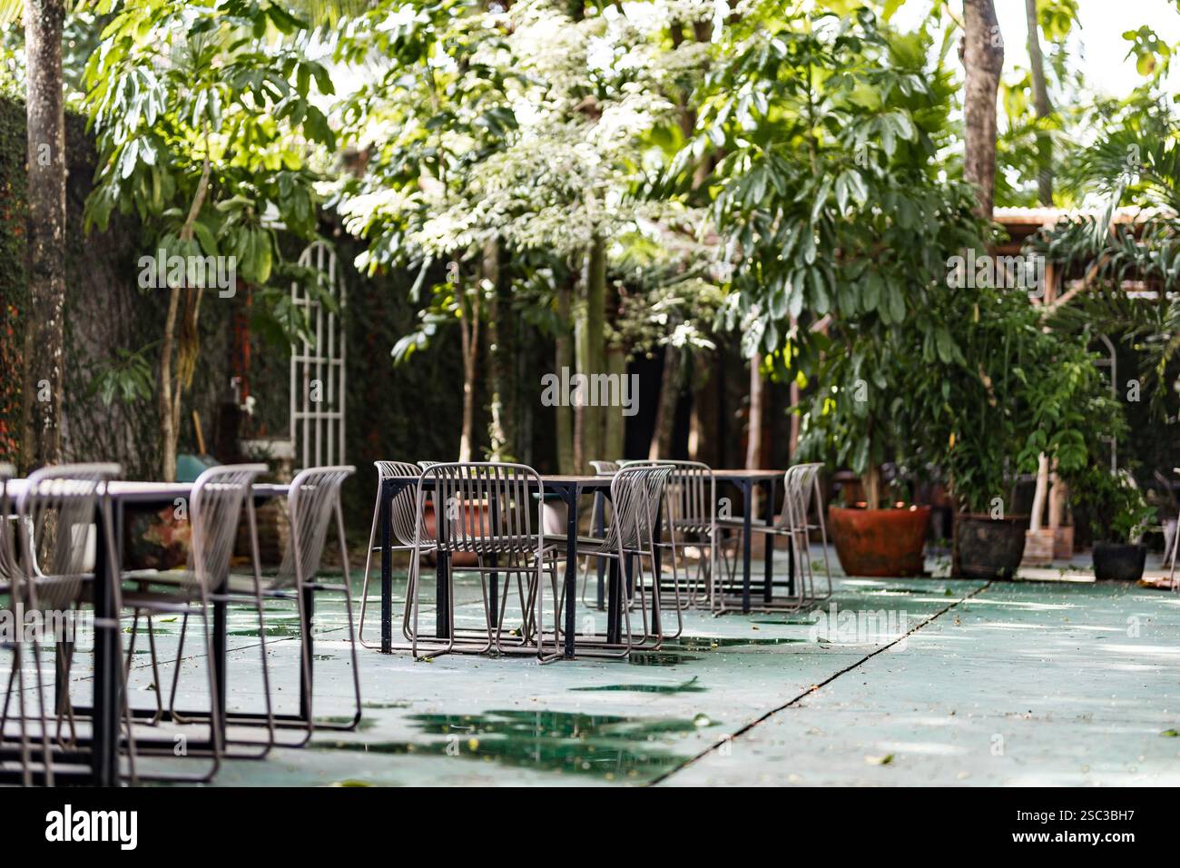 minimalist metal chair table in the terrace Stock Photo - Alamy