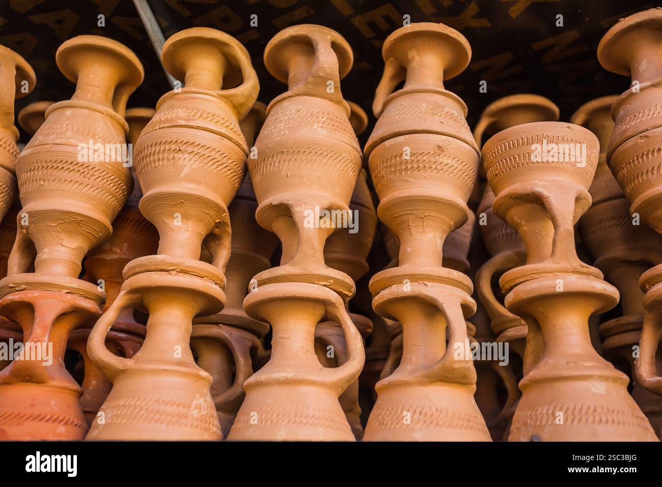 Eastern pitchers stand on a shelf in an Arab shop Stock Photo - Alamy