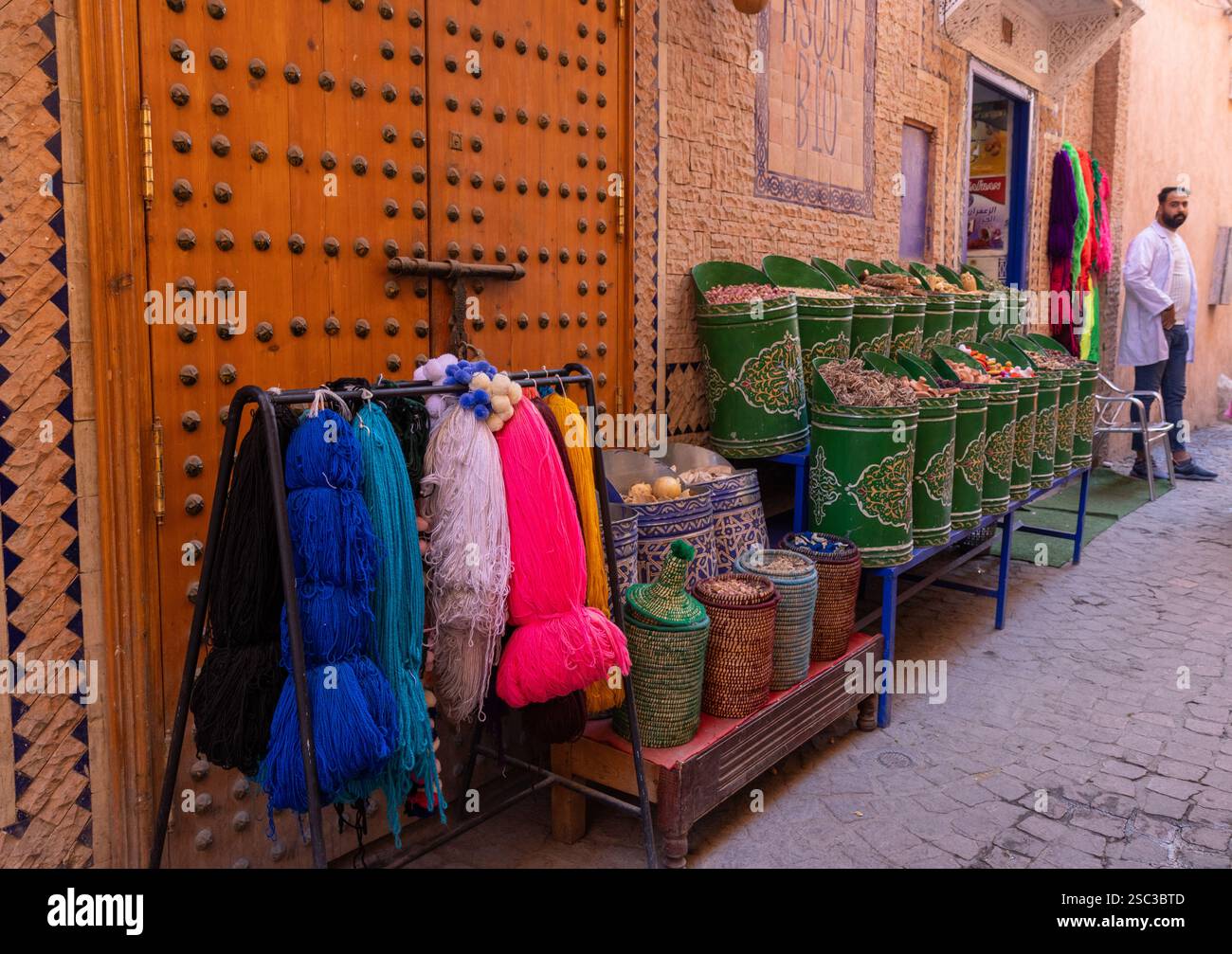 Souk of Marrakech Medina street life, tourists and locals walking ...