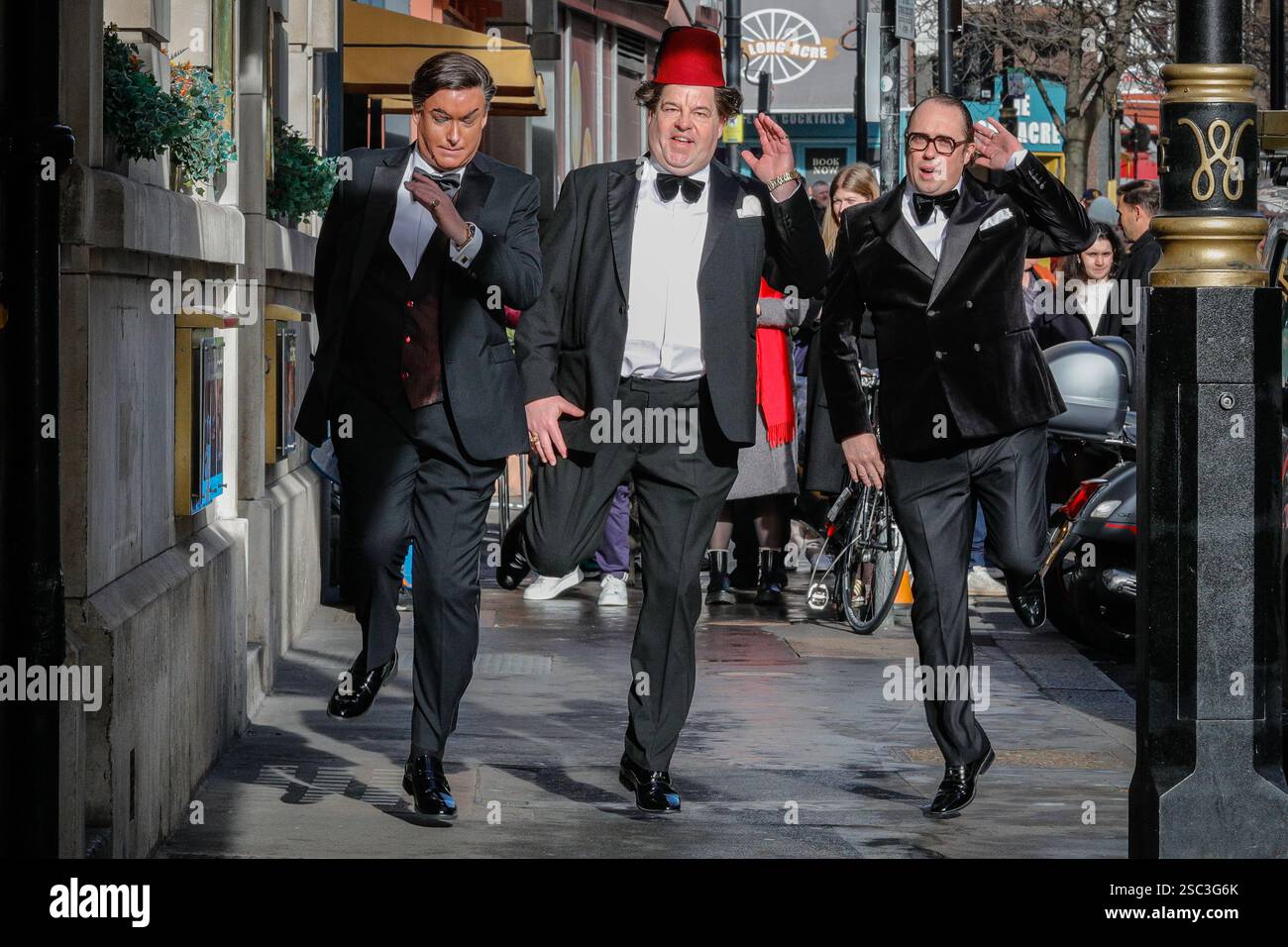 London, UK. 05th Feb, 2025. The cast members walk and 'dance' along on ...