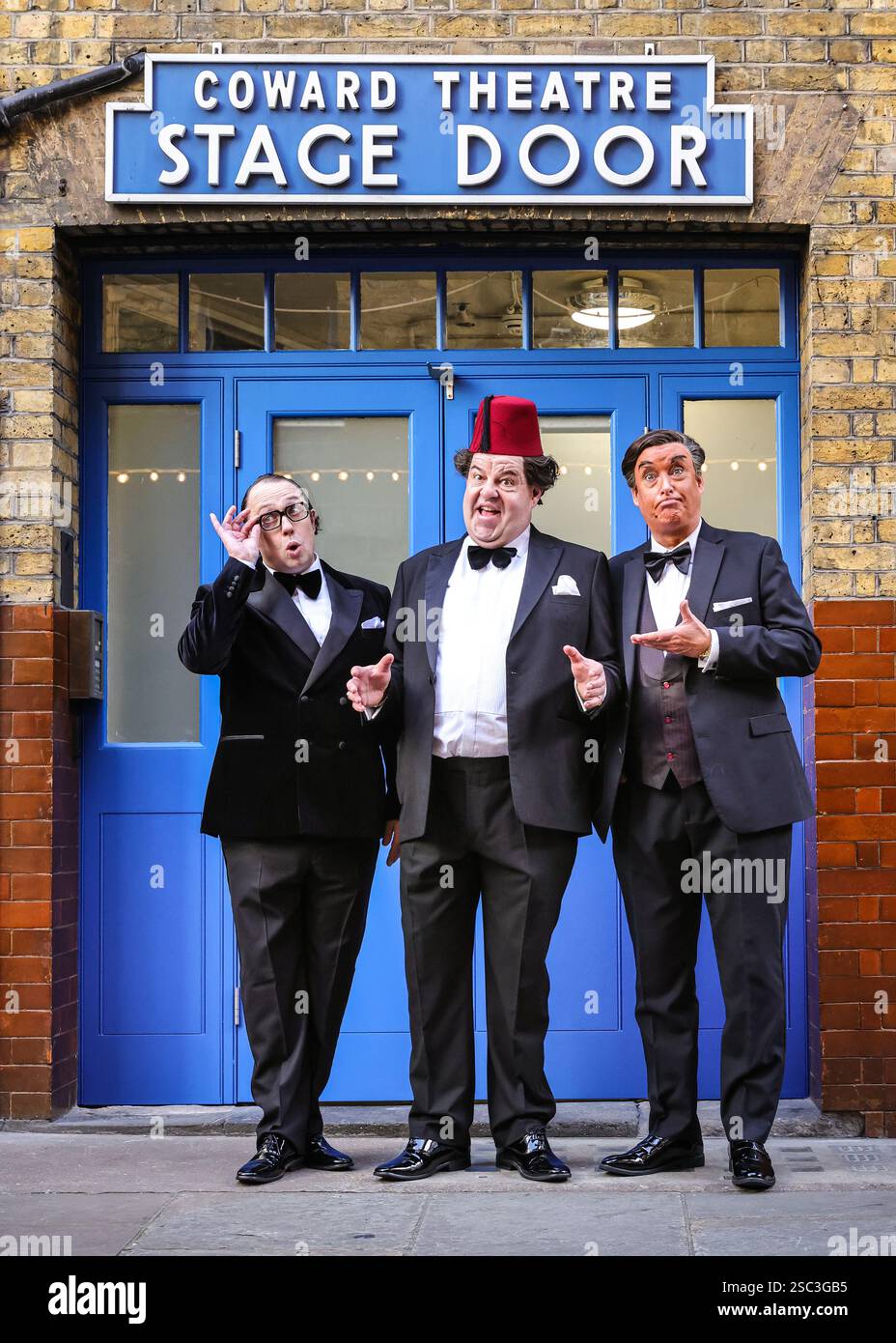 London, UK. 05th Feb, 2025. Cast members pose by the theatre's stage ...