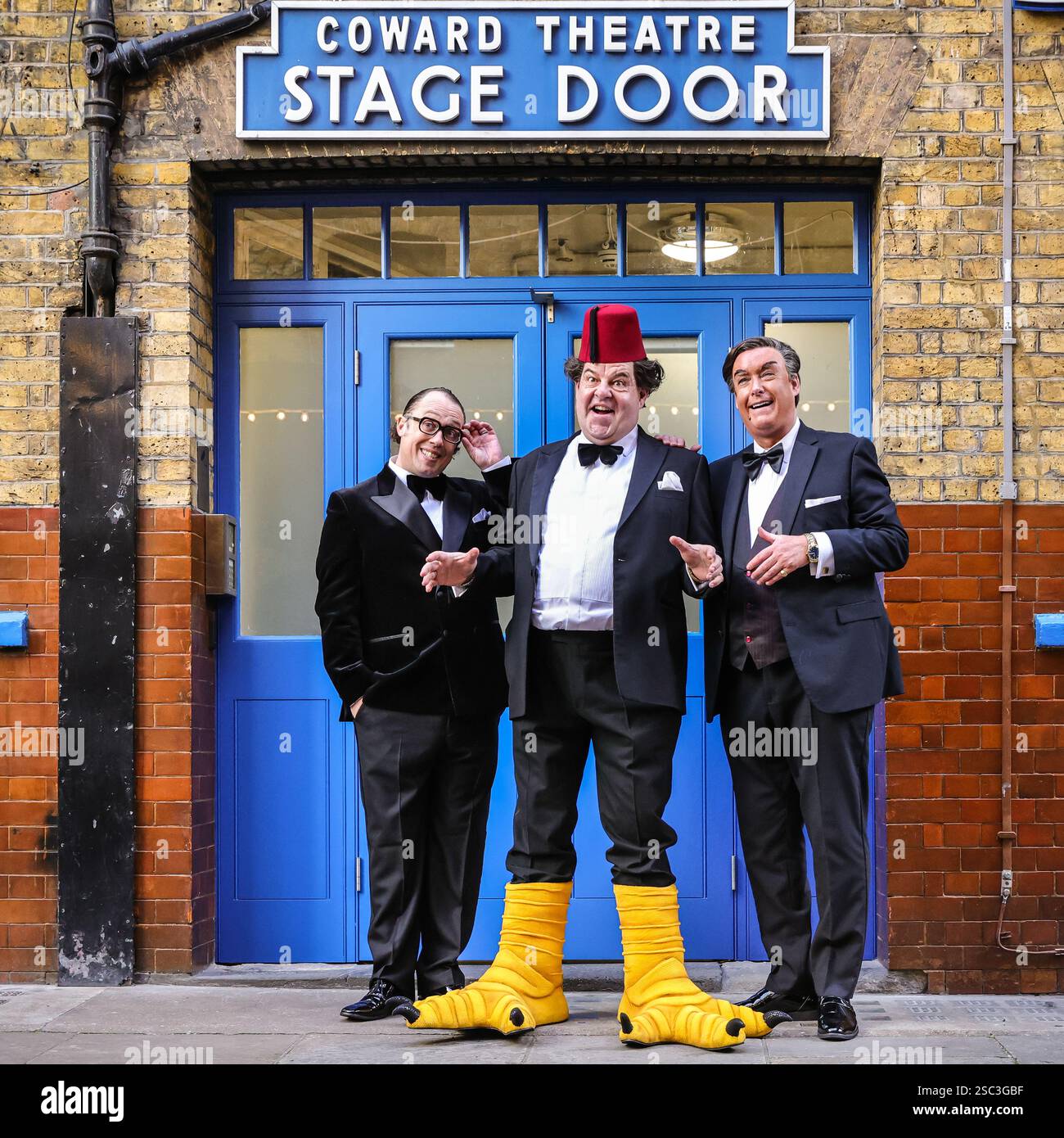 London, UK. 05th Feb, 2025. Cast members pose by the theatre's stage ...
