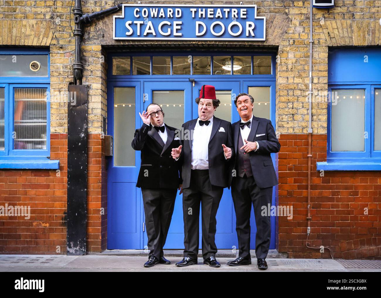 London, UK. 05th Feb, 2025. Cast members pose by the theatre's stage ...