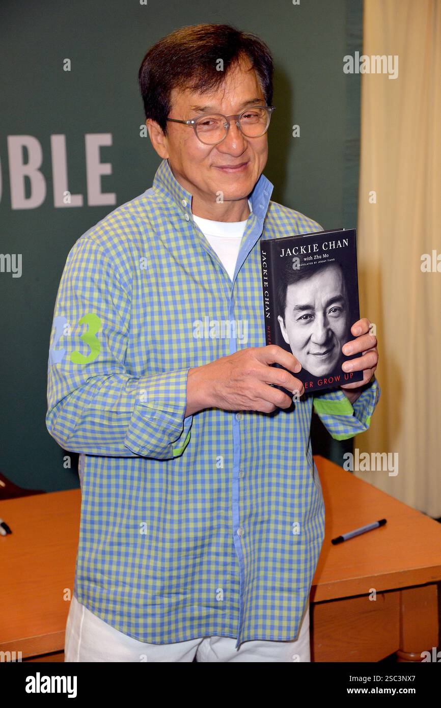 Jackie Chan signs copies of his book 'Never Grow Up' at Barnes & Noble ...