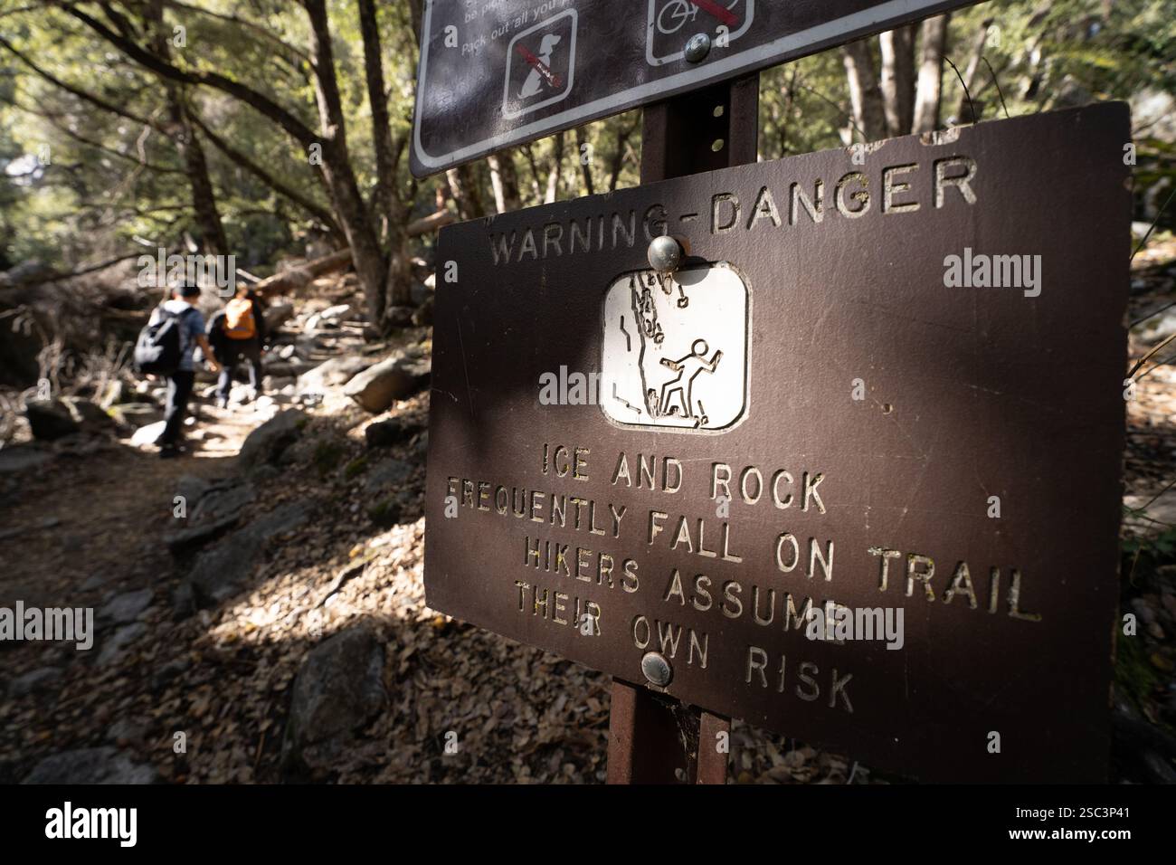 Warning sign at Yosemite National Park, advising of ice and rock fall ...