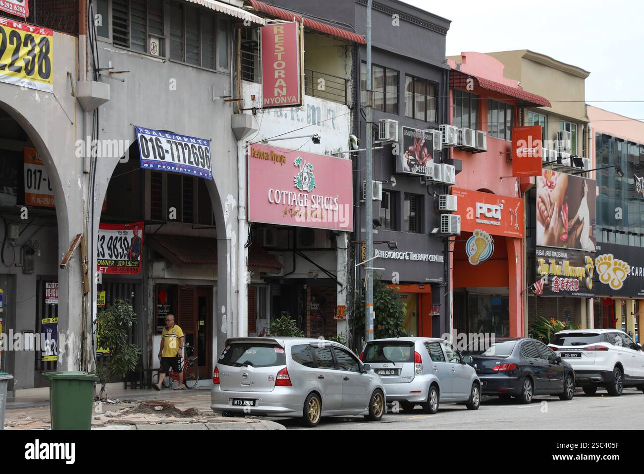 Shops on a street in Melaka, Malaysia Stock Photo - Alamy