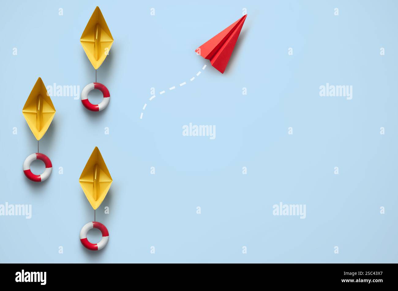 Red paper airplane amongst group of static boats, emerging as unique ...