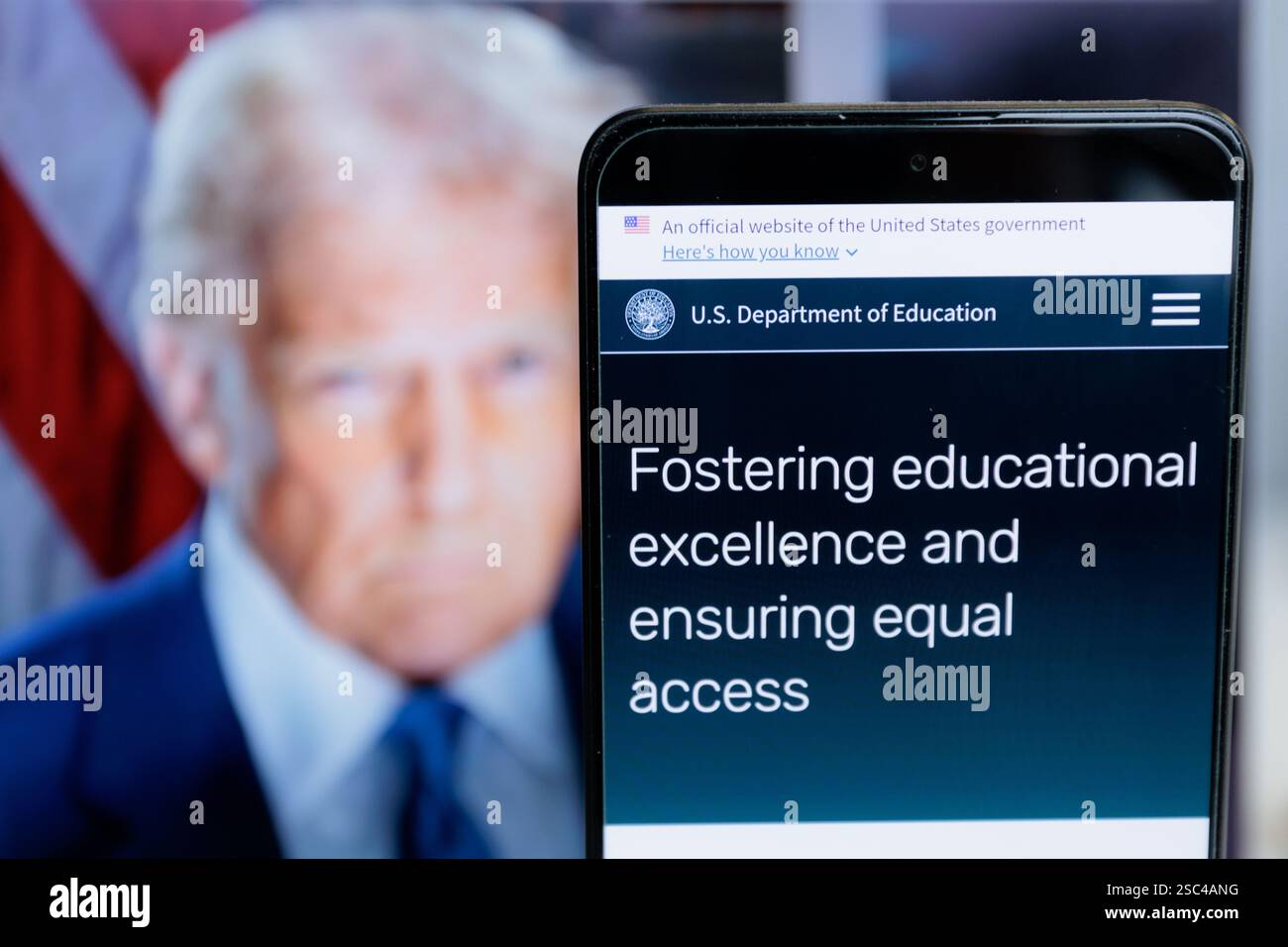 Screen displays the U.S. Department of Education website in background ...