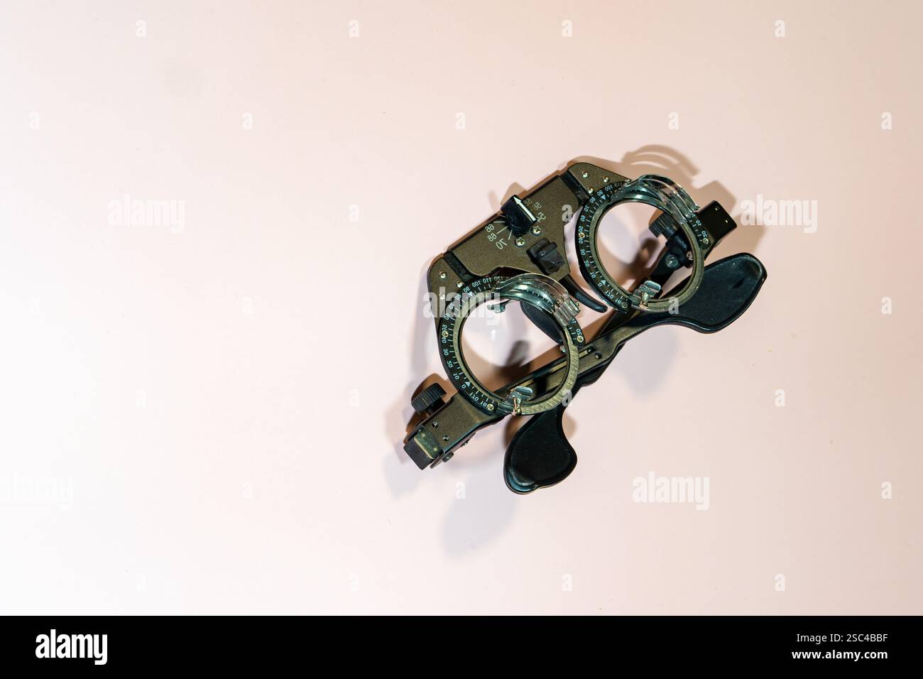 optical device for examining vision a pink surface Stock Photo - Alamy