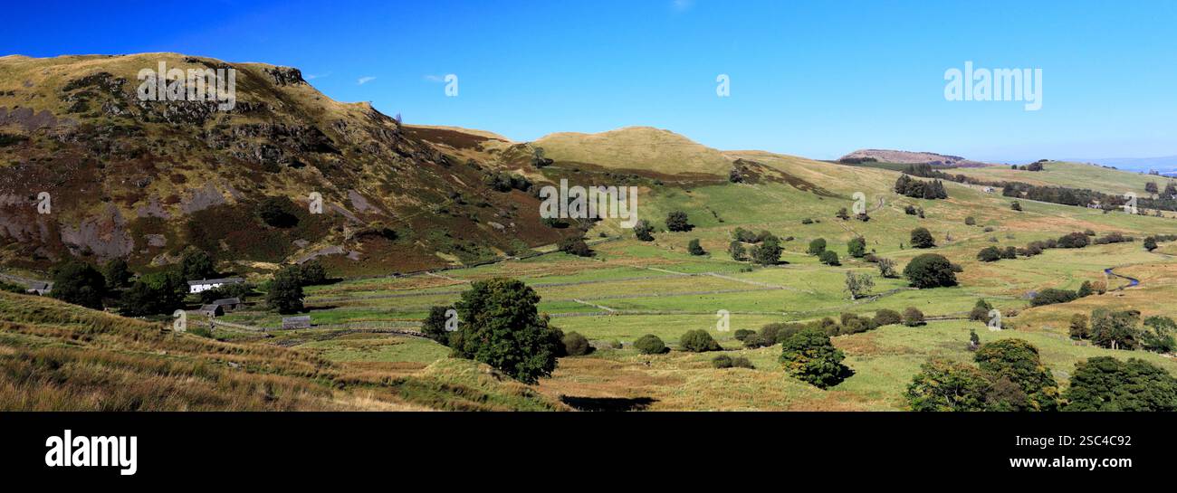 Summer view over Dowthwaitehead hamlet and farms in the upper valley of ...