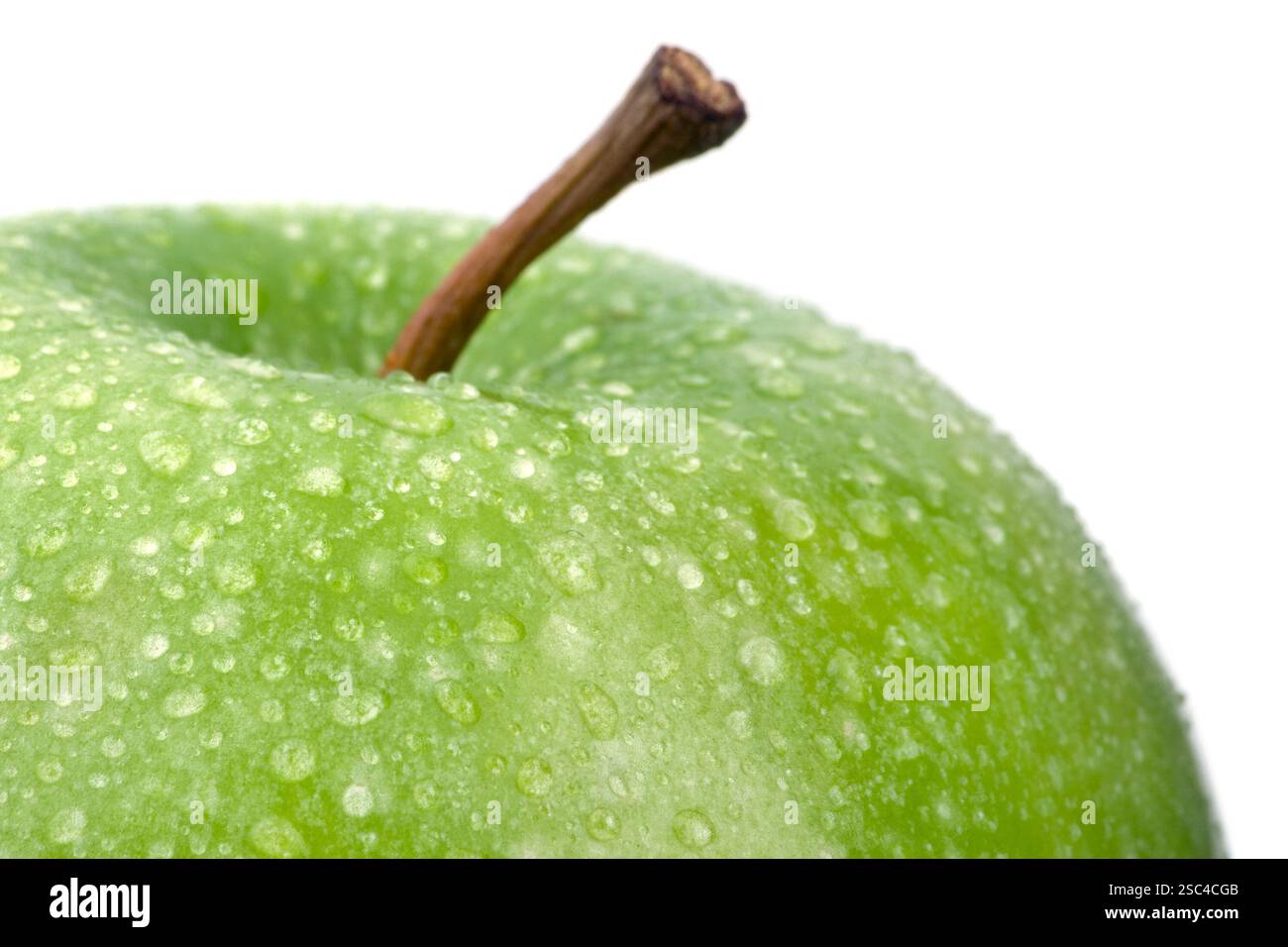 wet green apple isolated on white background. macro Stock Photo - Alamy