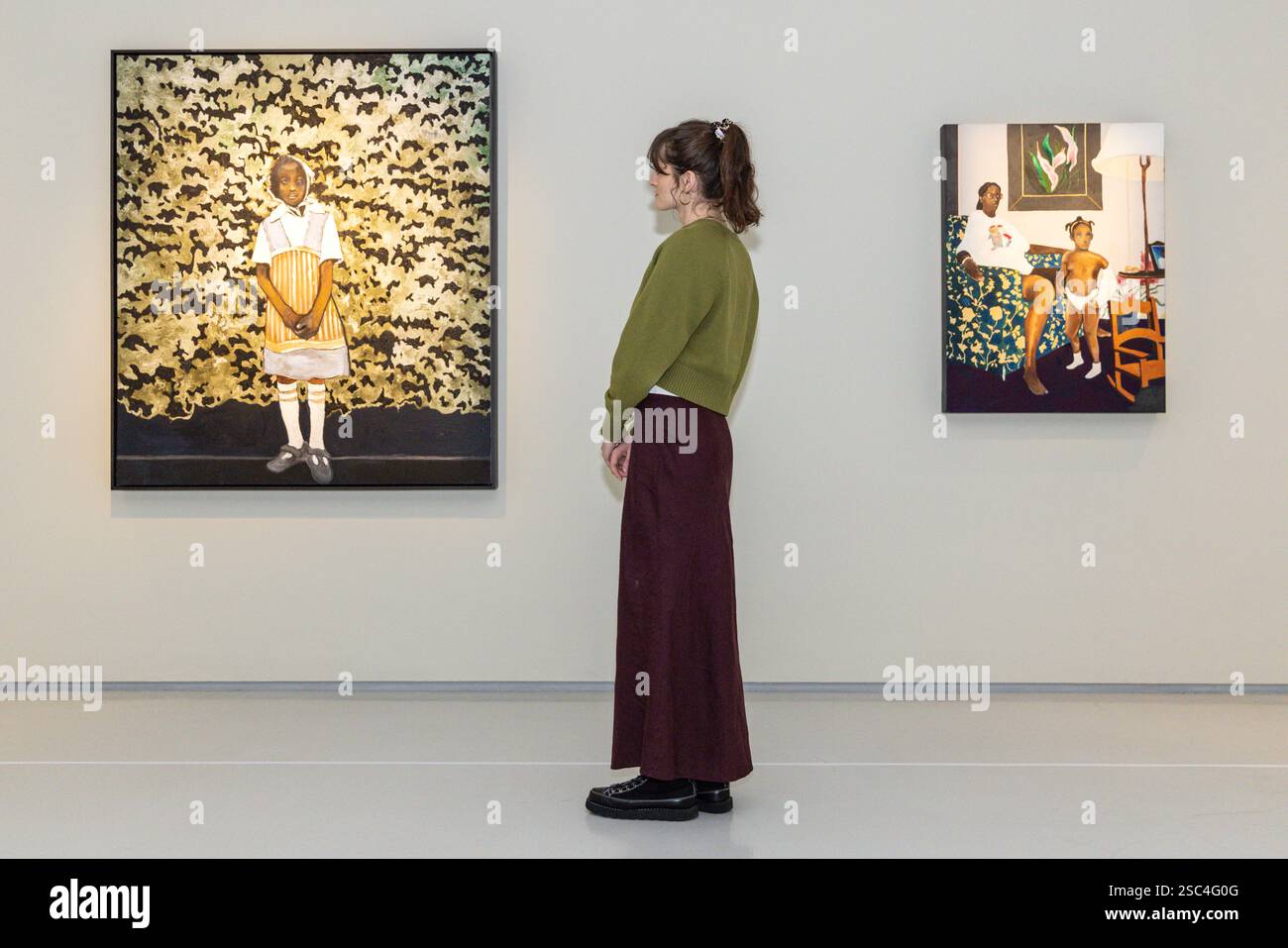 London, UK. 05th Feb, 2025. Exhibition staff with Noah Davis, Mary Jane ...