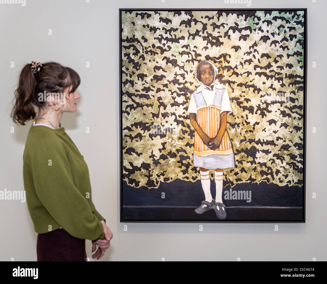 London, UK. 05th Feb, 2025. Exhibition staff with Noah Davis, Mary Jane ...