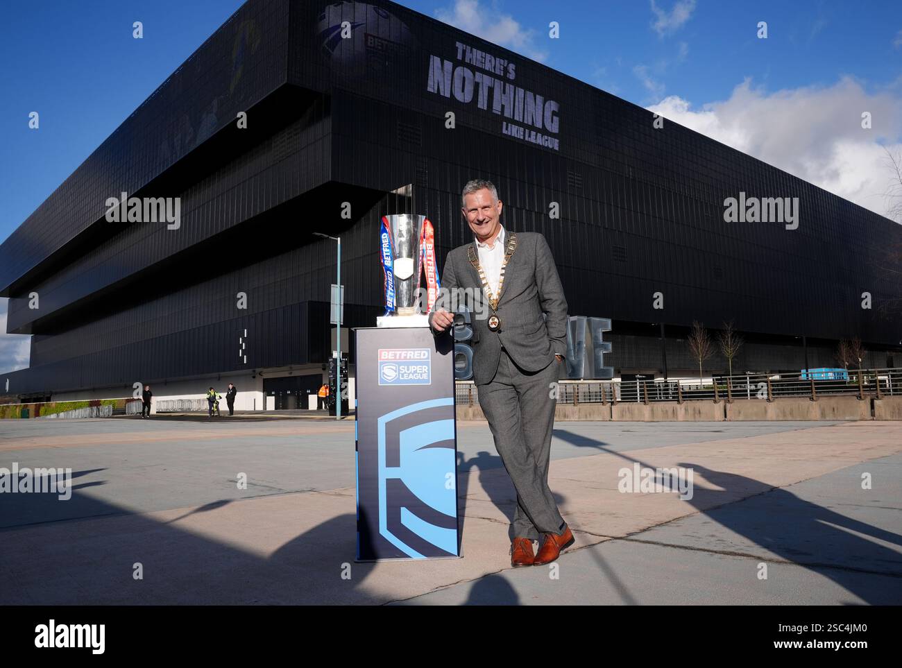 Comedian Adam Hills with the trophy outside the Co-op Live arena ...
