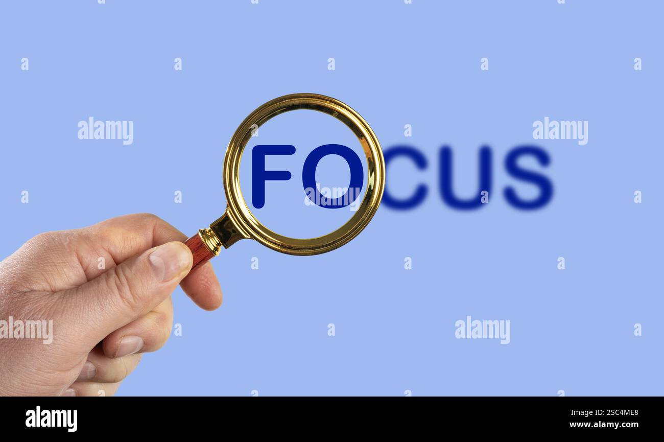 the focus on through a Magnifying glass Stock Photo - Alamy