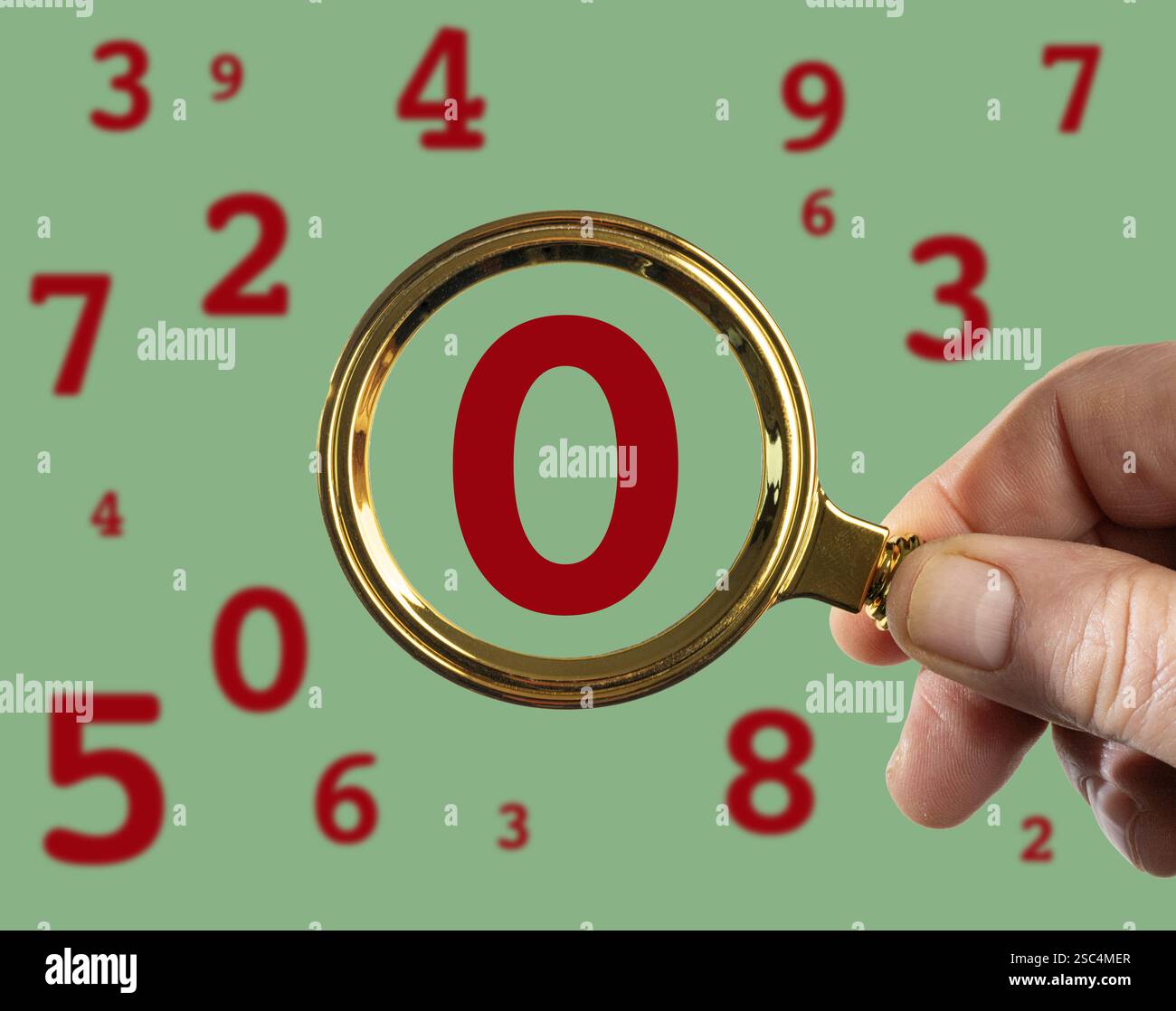 the focus on number 0 through a Magnifying glass Stock Photo - Alamy