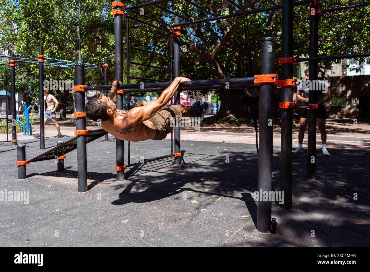 Wide Grip FrontLever - Calisthenics Trick (rear view Stock Photo - Alamy