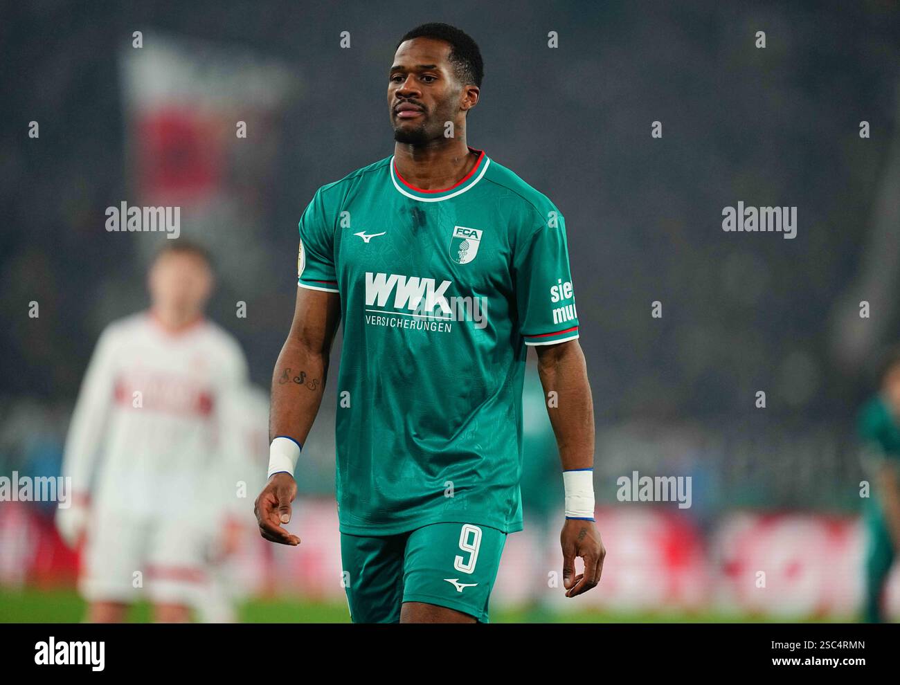 February 04 2025: Samuel Essende of FC Augsburg looks on during a DFB ...