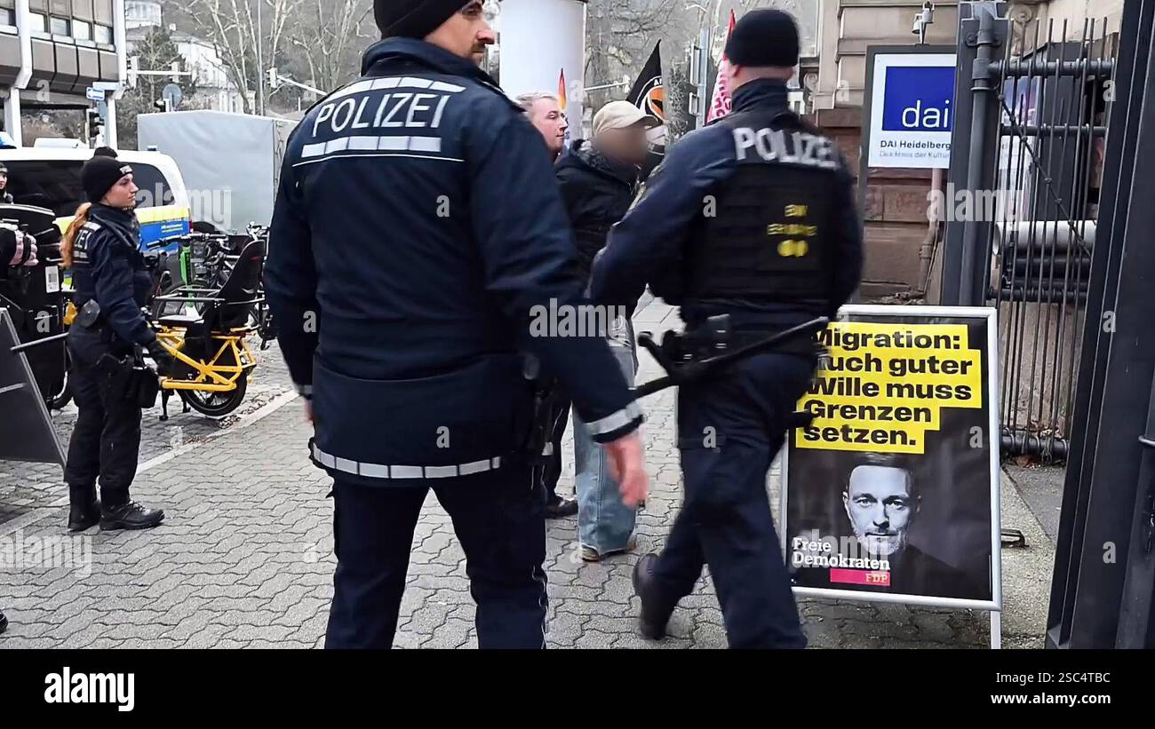 Heidelberg, Germany. 05th Feb, 2025. Police officers take a man (center ...