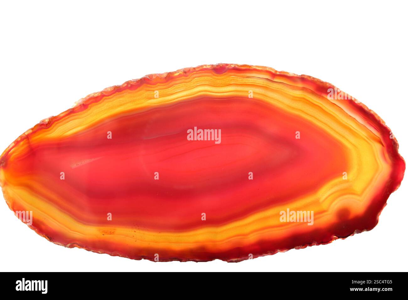 Red and yellow translucent agate slice isolated on white background ...