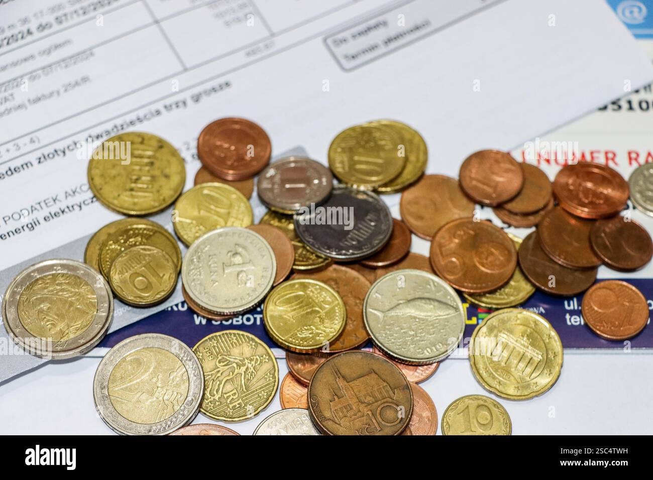 Coins from different countries on a table Stock Photo - Alamy
