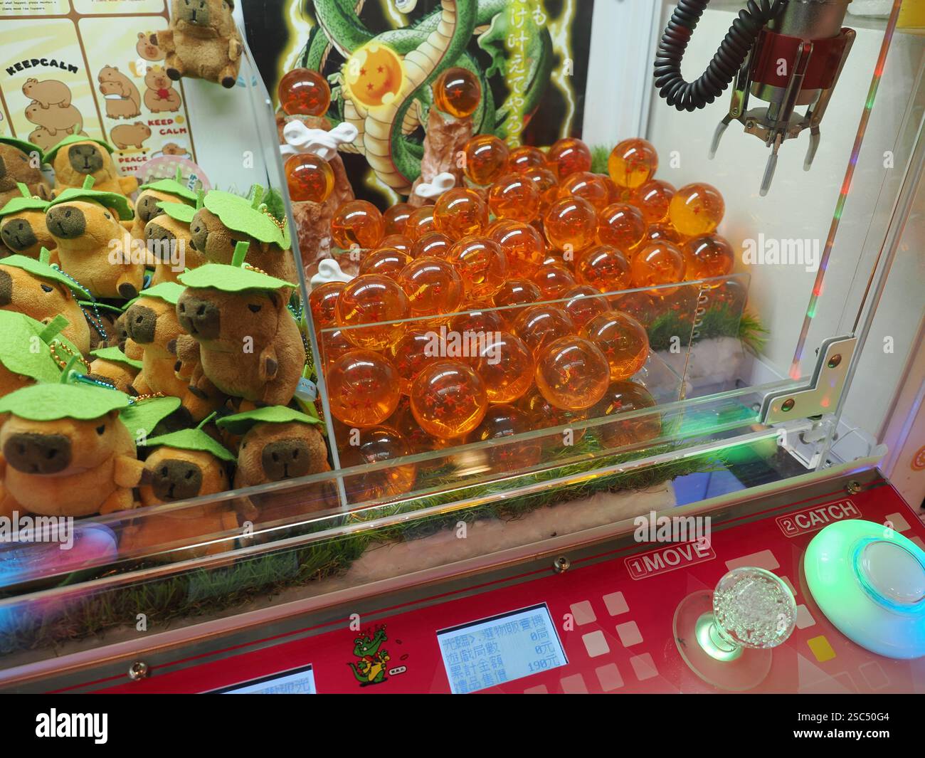 Small Dragon Balls from the anime series Dragon Ball Z in a claw ...