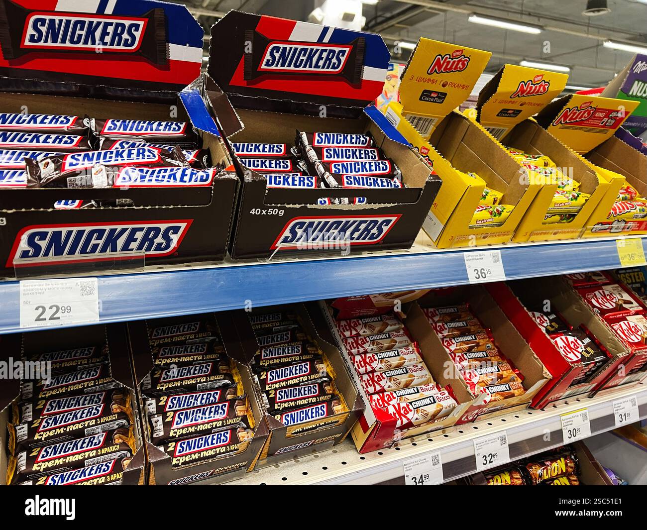 Kyiv, Ukraine - February 04, 2025: Chocolate and candy bars neatly ...
