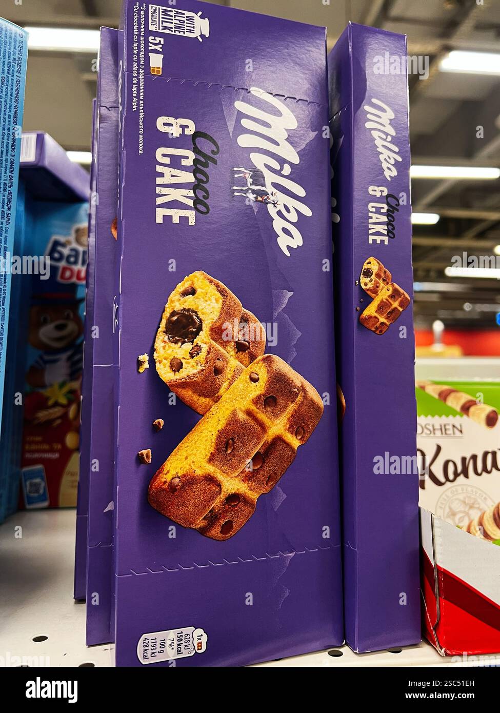 Kyiv, Ukraine - February 04, 2025: Milka chocolate cake snack packaging ...