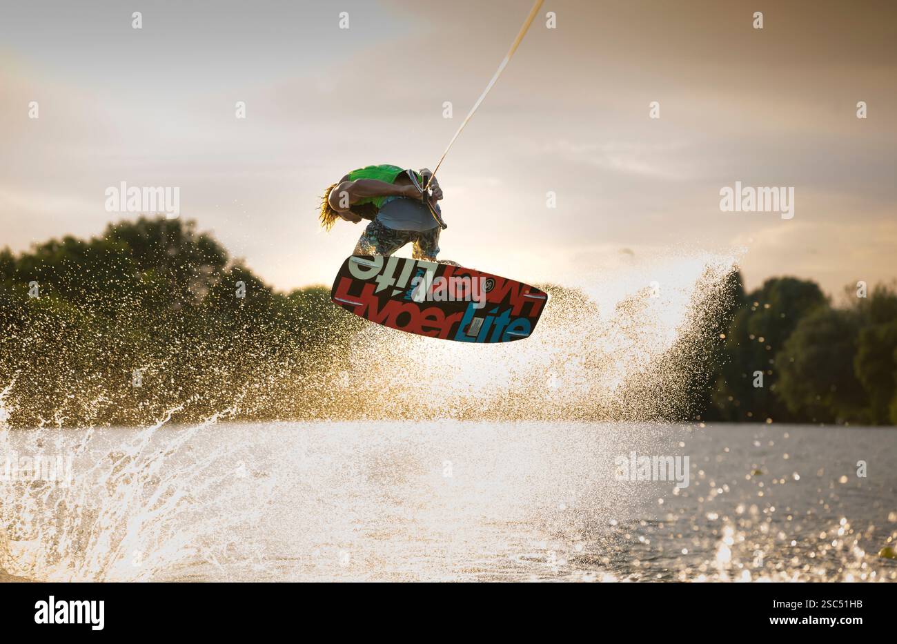 Wakeboarding behind a boat in The Cotswold Water Park, England Stock ...