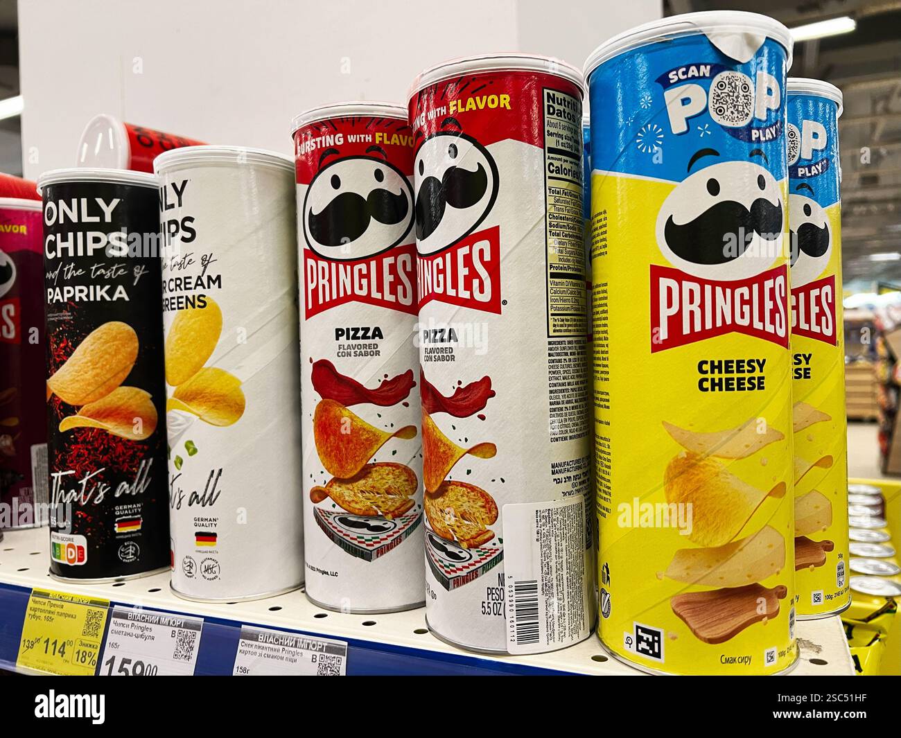Kyiv, Ukraine - February 04, 2025: Assorted chip cans, including ...