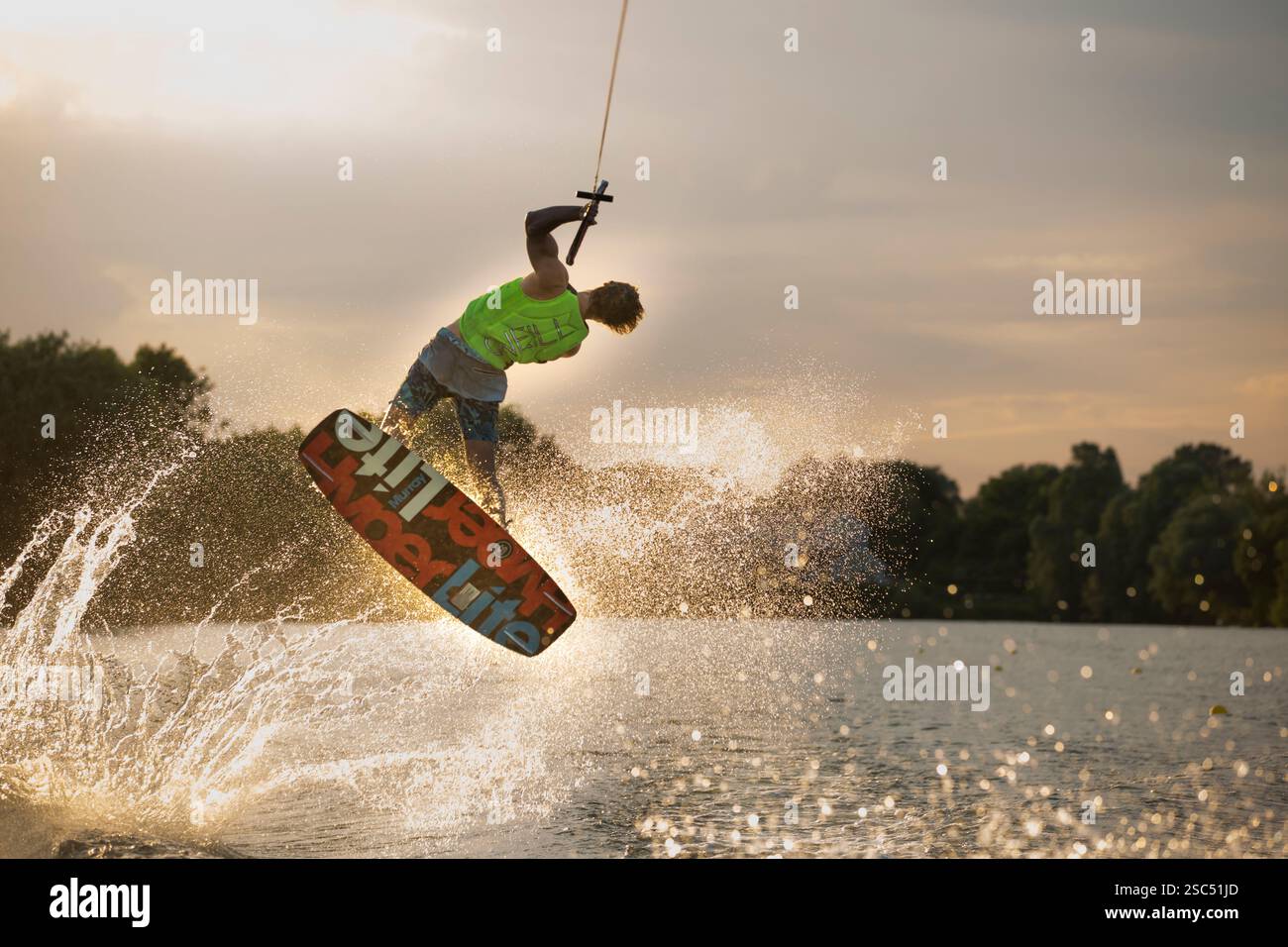 Wakeboarding behind a boat in The Cotswold Water Park, England Stock ...