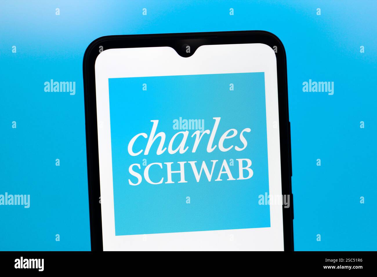 In this photo illustration, the Charles Schwab Corporation logo is seen ...