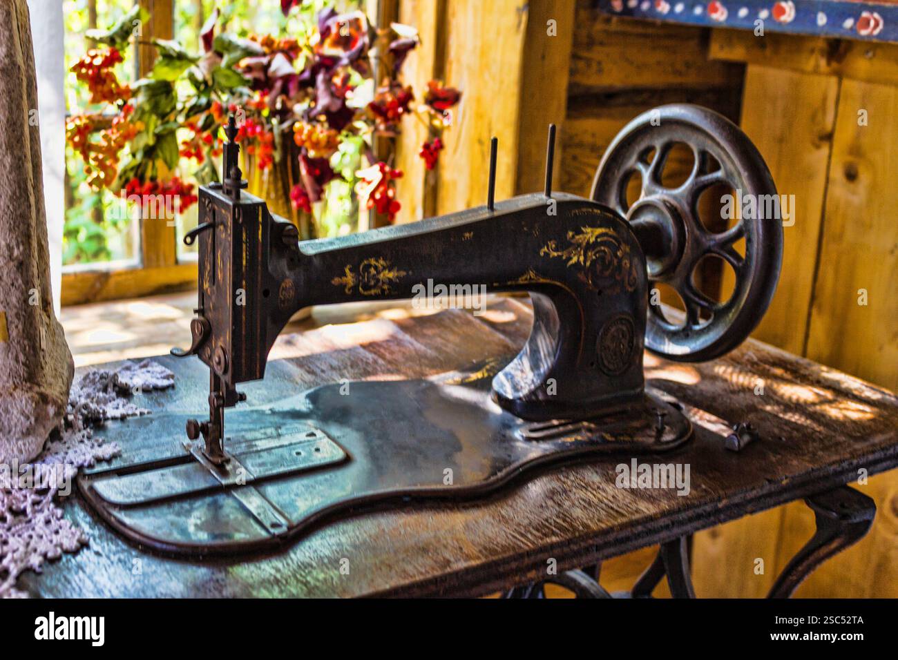 Antique sewing machine in the interior of the ancient Russian hut Stock ...
