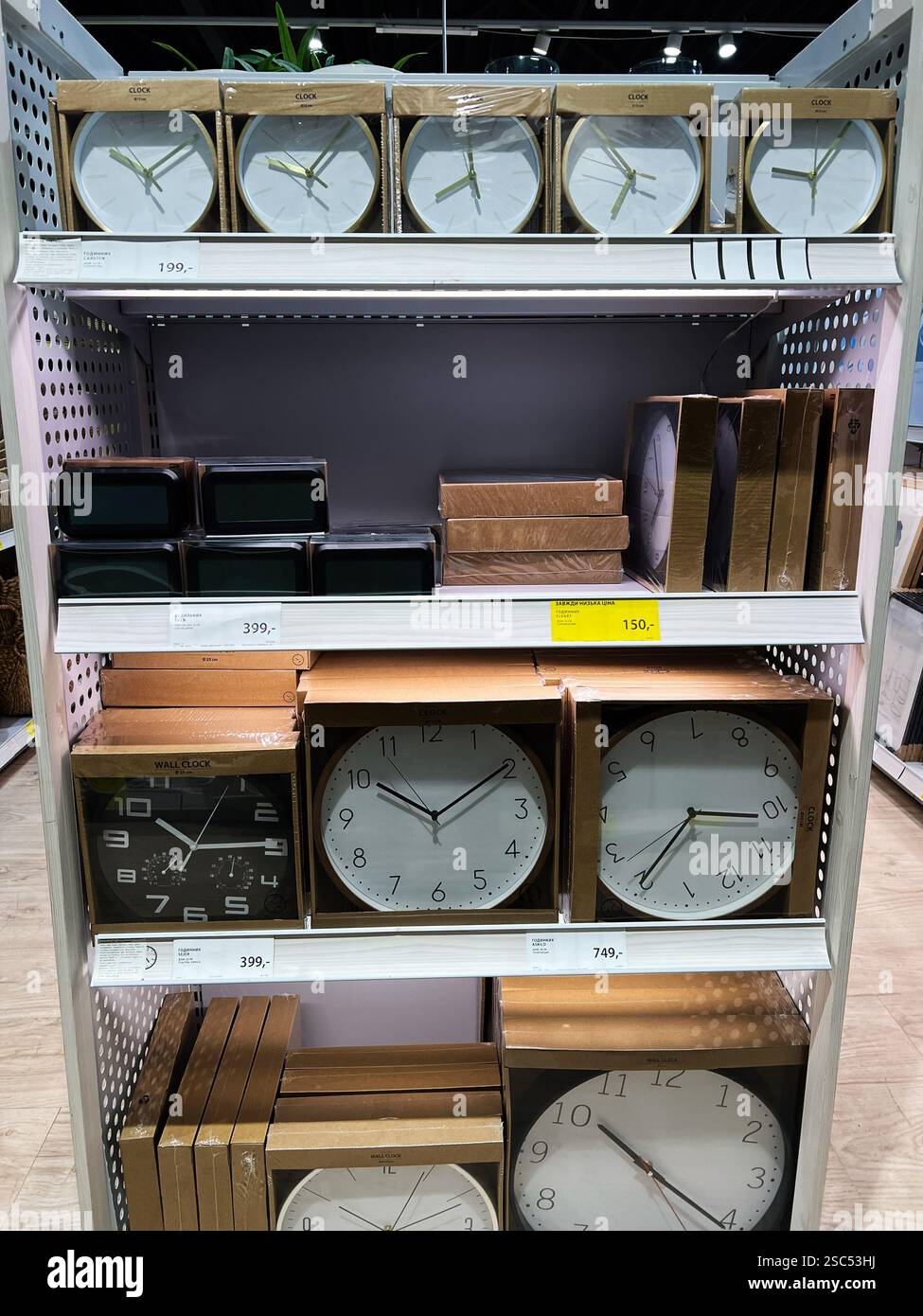 Kyiv, Ukraine - February 04, 2025: Shelf showcasing clocks of various ...