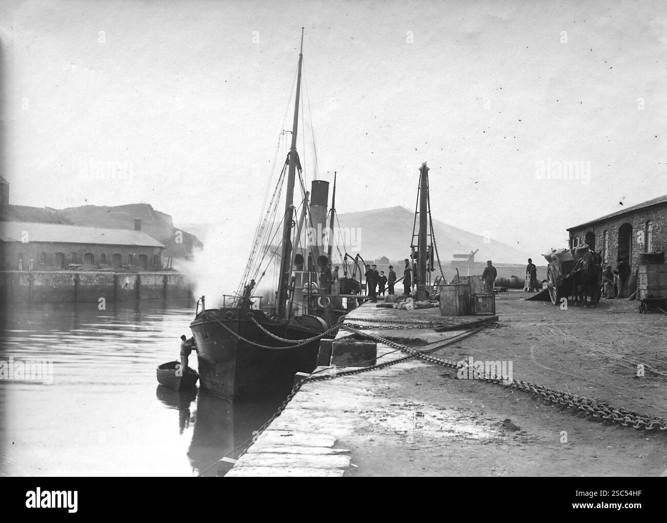 Boats in the harbour with people on the dock, Aberystwyth, Ceredigion ...