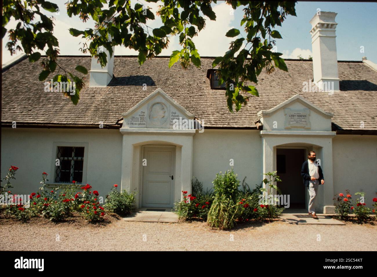 A person stands outside the Liszt Ferencz Memorial Museum in Raiding ...