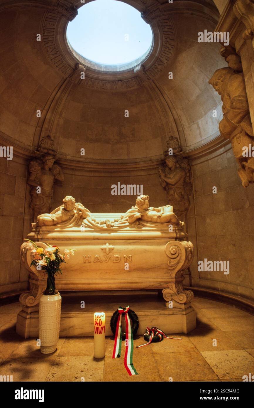 Tomb of Haydn in Eisenstadt, featuring ornate sculptures and floral ...