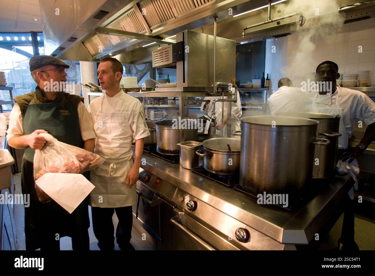 Farmer Andrew Sharp with meat in his cold store at Borough Market ...