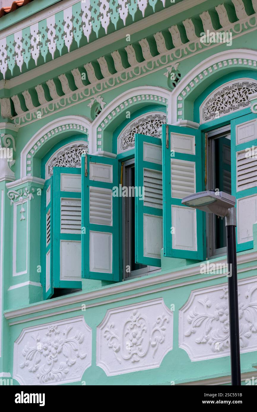 Window details on a colourful and ornate Peranakan Shophouse in Koon ...